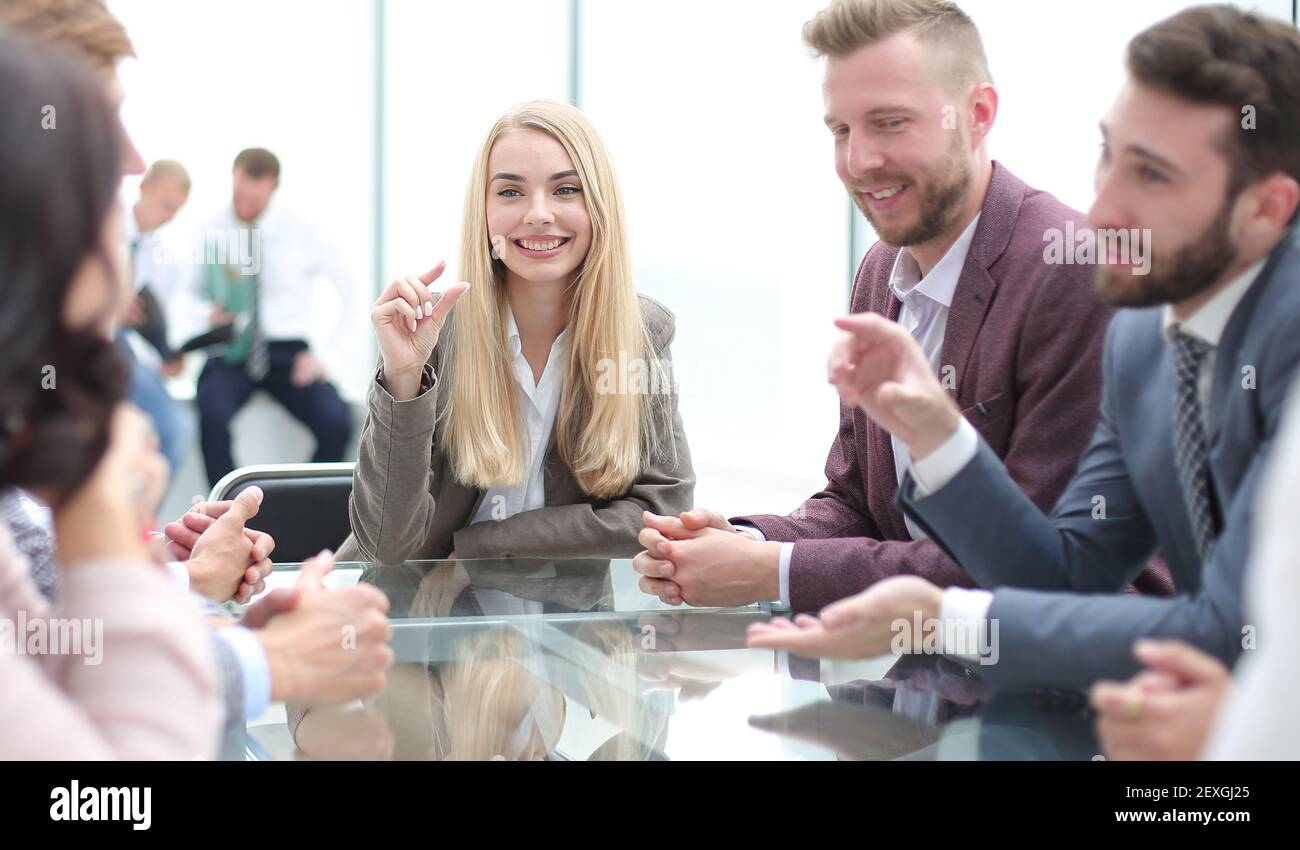 young businesswoman explaining new tasks at a working meeting Stock ...
