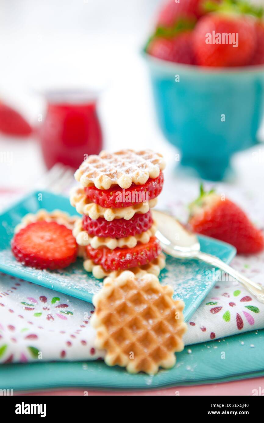 Small waffles and strawberries Stock Photo - Alamy