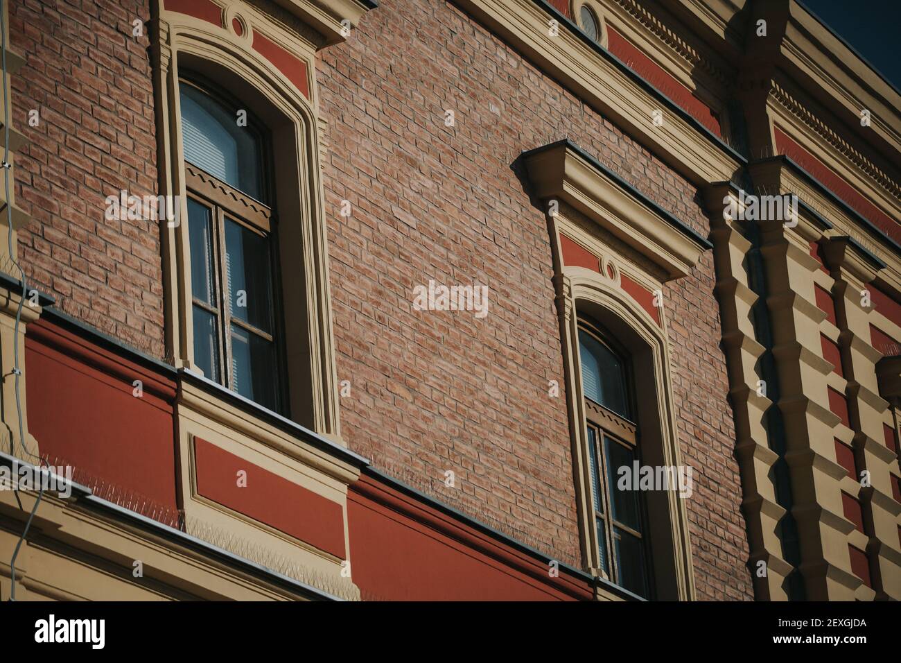 The windows in a red brick wall Stock Photo - Alamy