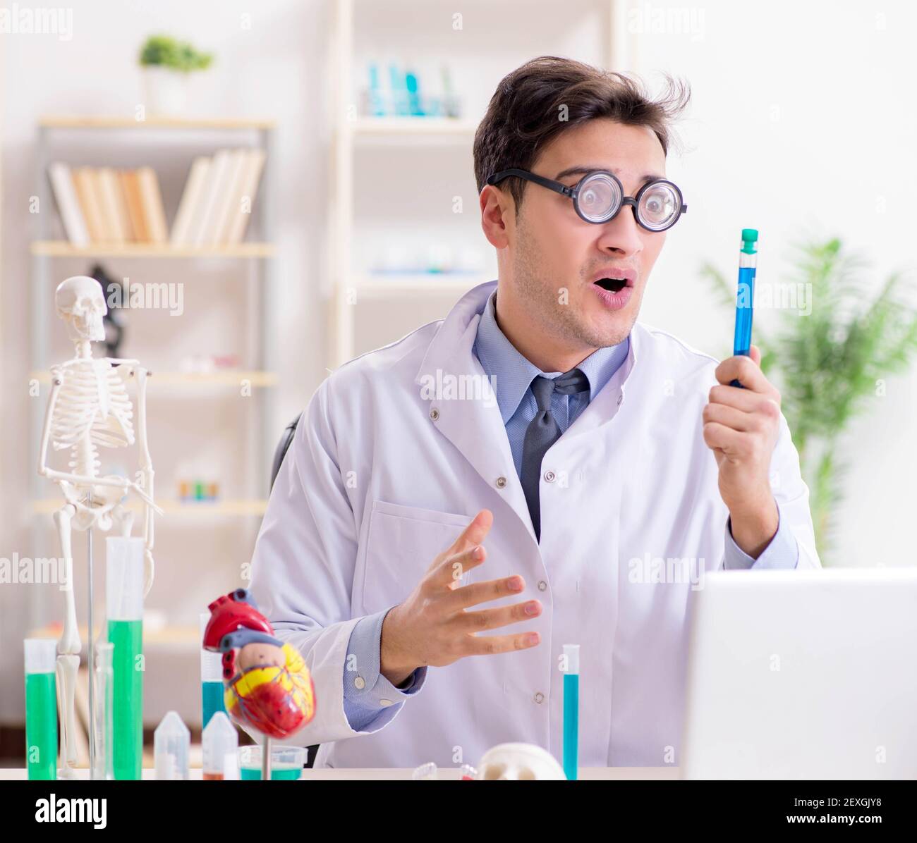 The funny doctor having fun in hospital lab Stock Photo - Alamy