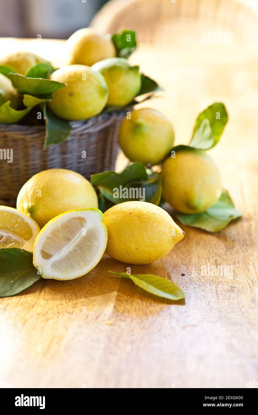 Fresh lemons green leaf hi-res stock photography and images - Alamy