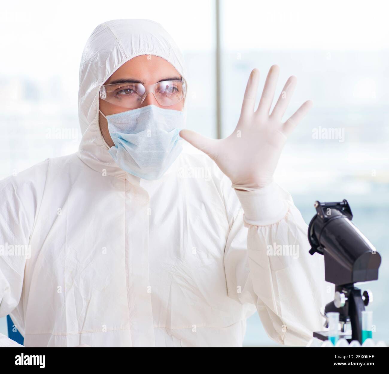 The young chemist pressing virtual buttons in lab Stock Photo - Alamy