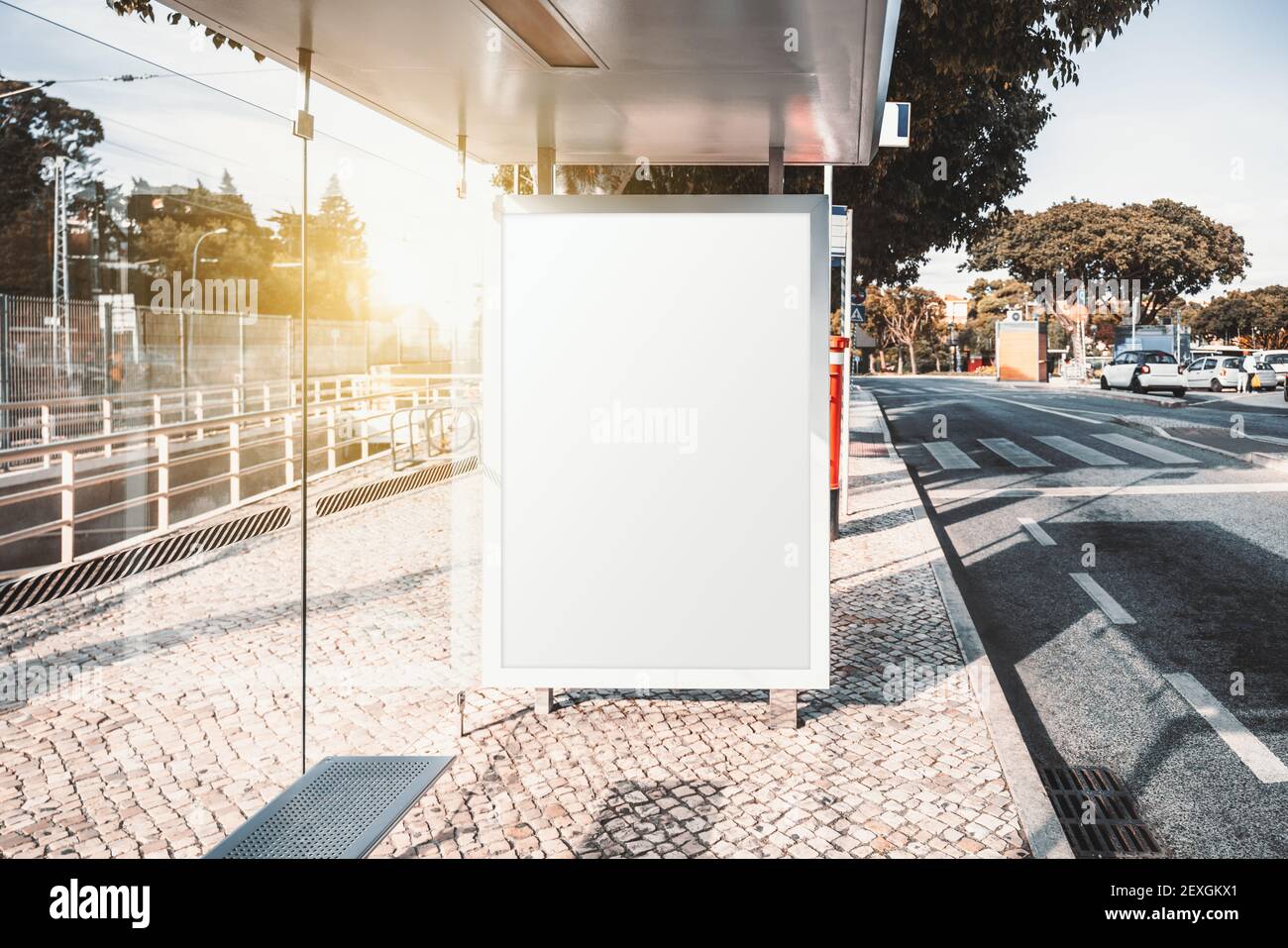 A modern bus stop with an empty placeholder of an advertising billboard ...
