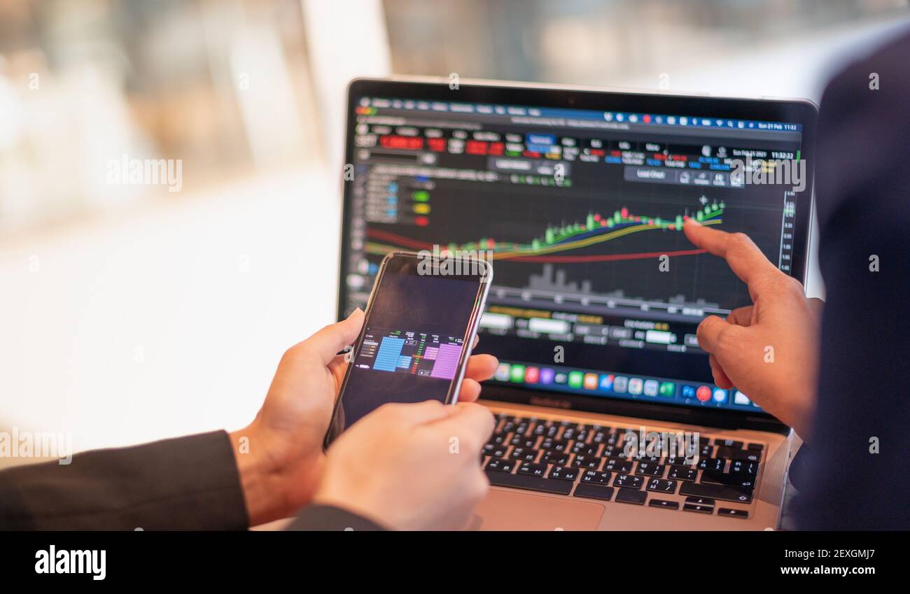 The group of business investor trading or stock brokers having a ...