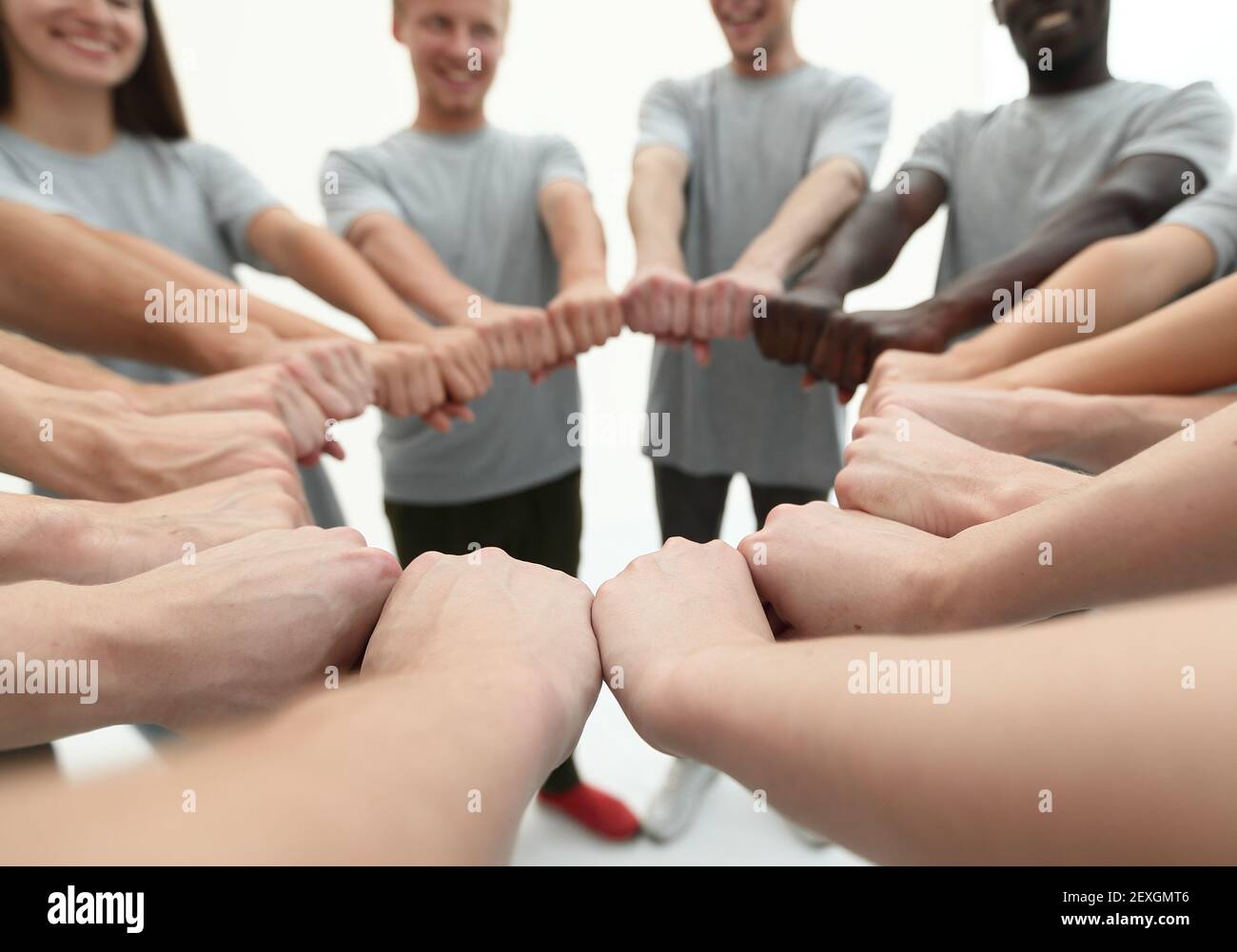 Multiracial hands making a circle hi-res stock photography and images ...