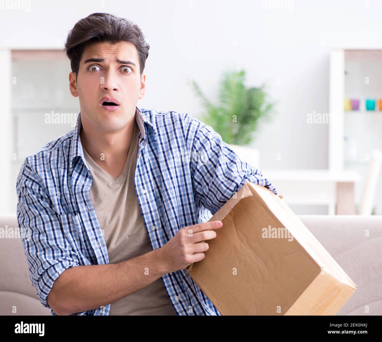 The man receiving empty parcel with stolen goods Stock Photo - Alamy