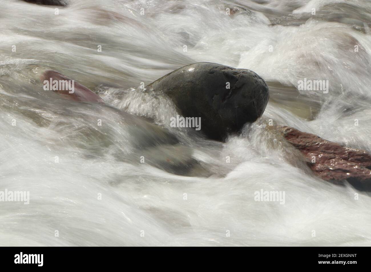 Heddon river flowing through the valley and over rocky ground Stock ...