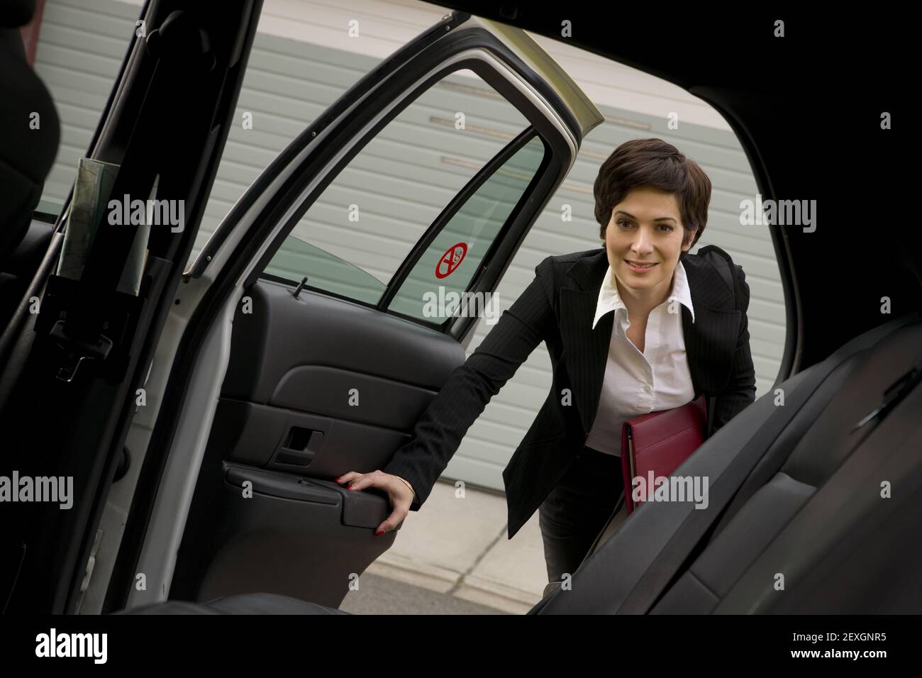 Female exiting car hi-res stock photography and images - Alamy