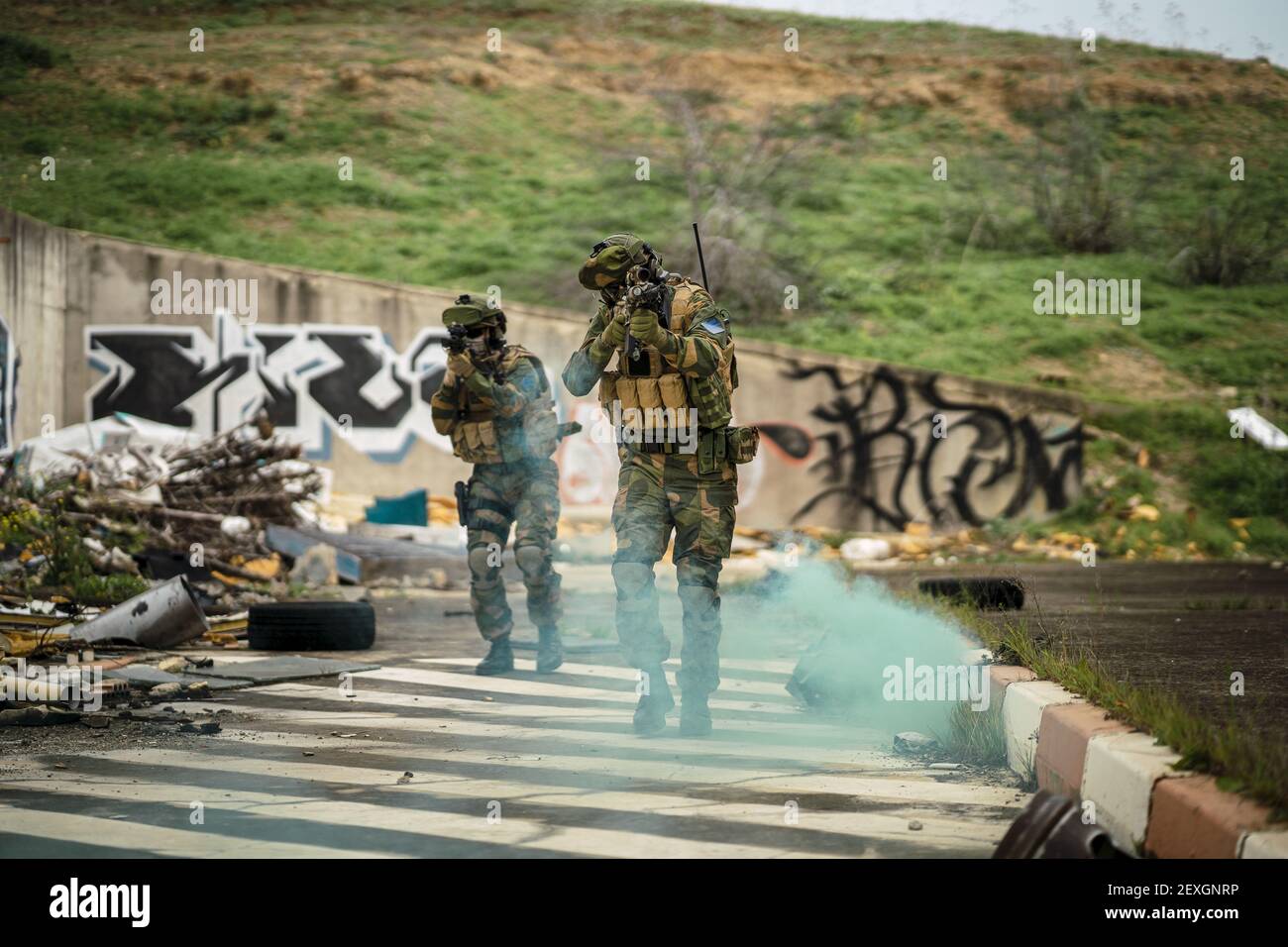 A shallow focus of a group of special force soldiers investigating an ...