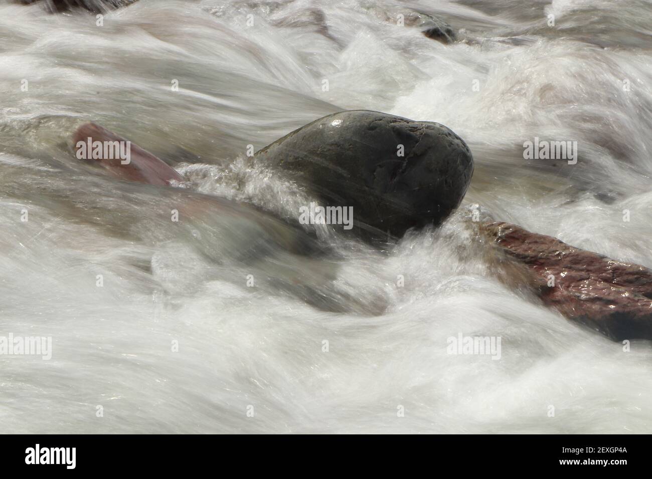Heddon river flowing through the valley and over rocky ground Stock ...