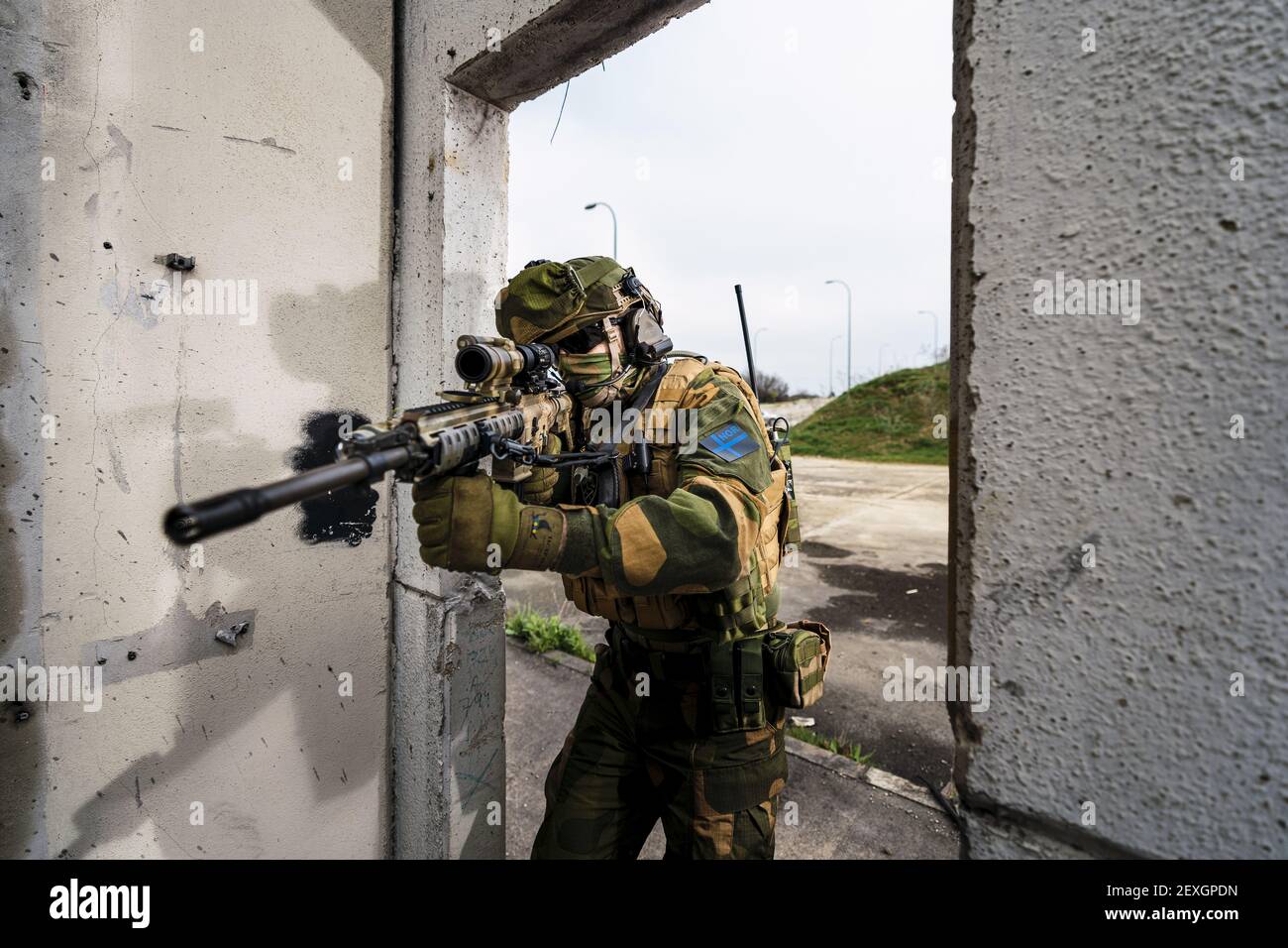 A shallow focus of a group of a special force soldier investigating an ...