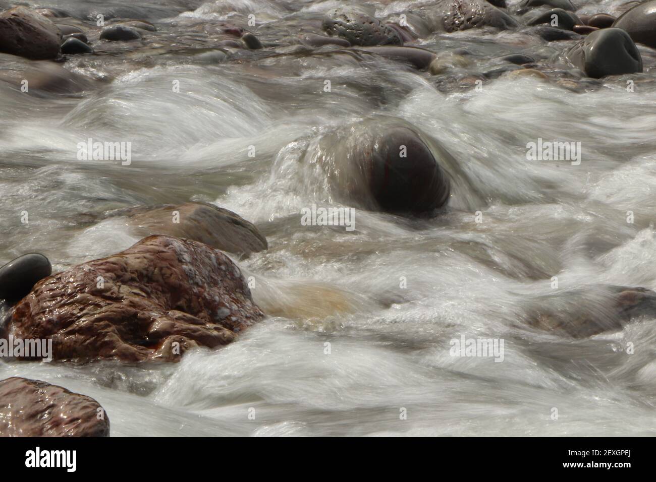 Heddon river flowing through the valley and over rocky ground Stock ...