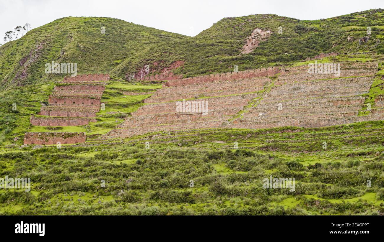 stepped Inca walls ruins on side of andes mountain, Urubamba Peru Stock ...
