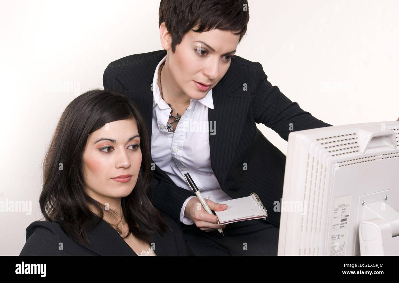 Two at Work Stock Photo - Alamy