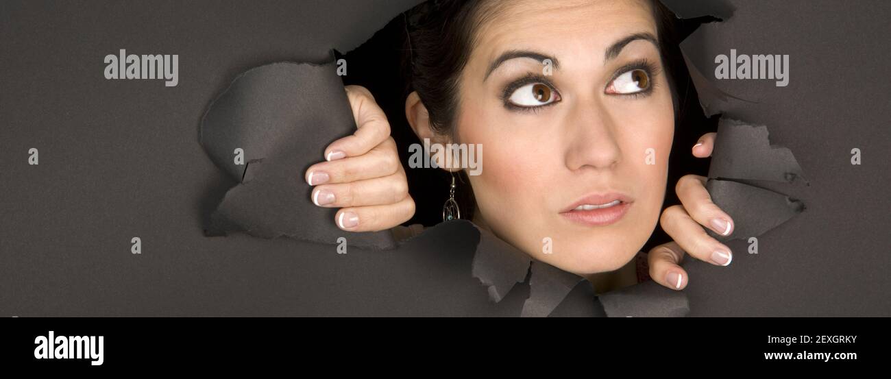 Looking peeking hi-res stock photography and images - Alamy