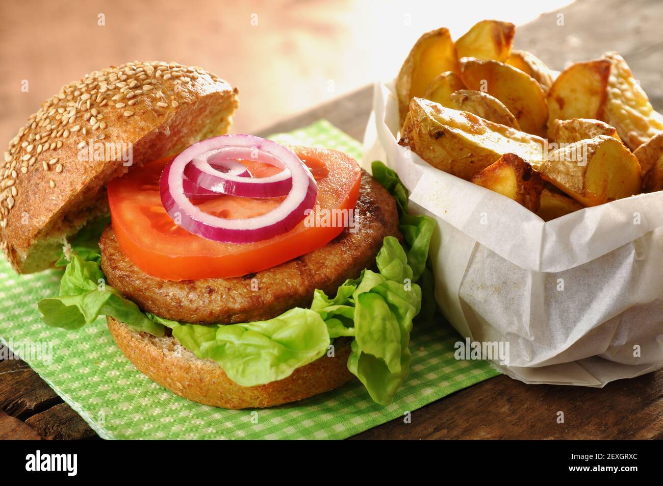 Food: Homemade Veggie Burger and Potatoe Wedges Stock Photo - Alamy