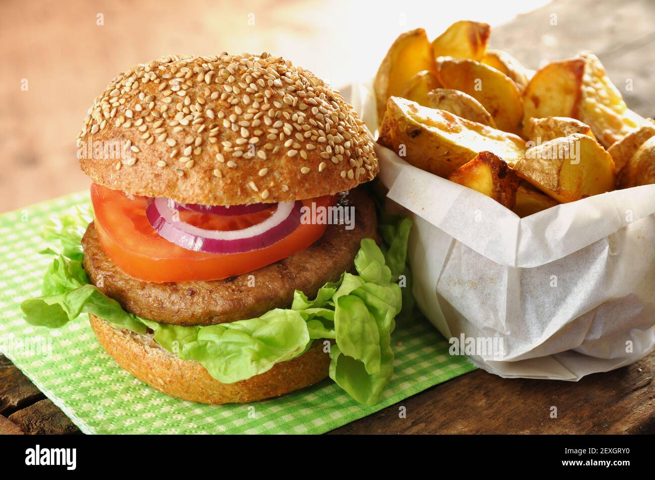 Food: Homemade Veggie Burger and Potatoe Wedges Stock Photo - Alamy