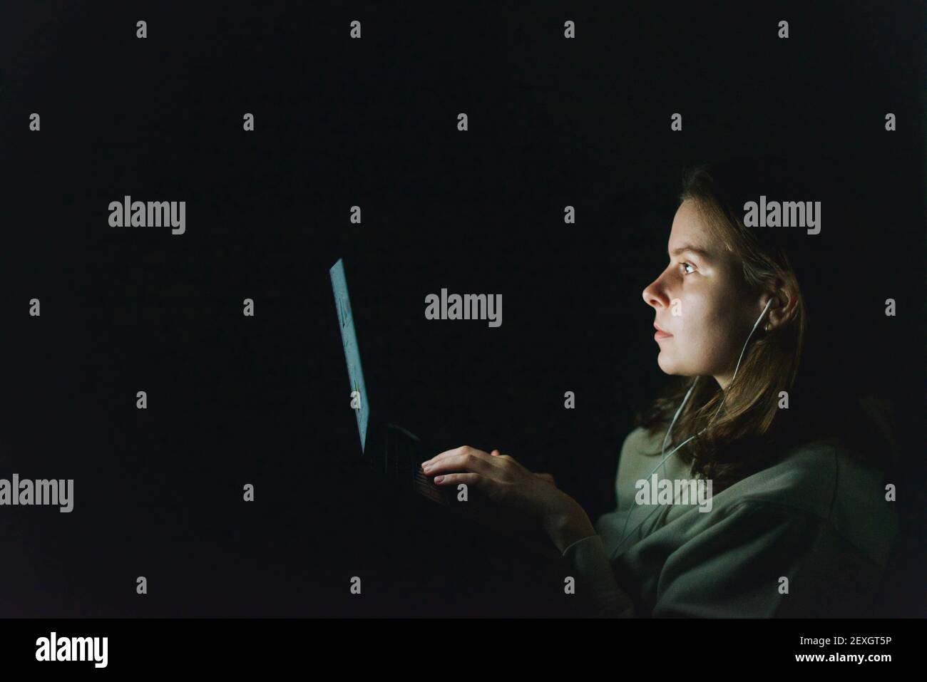 woman working on laptop at night Stock Photo - Alamy