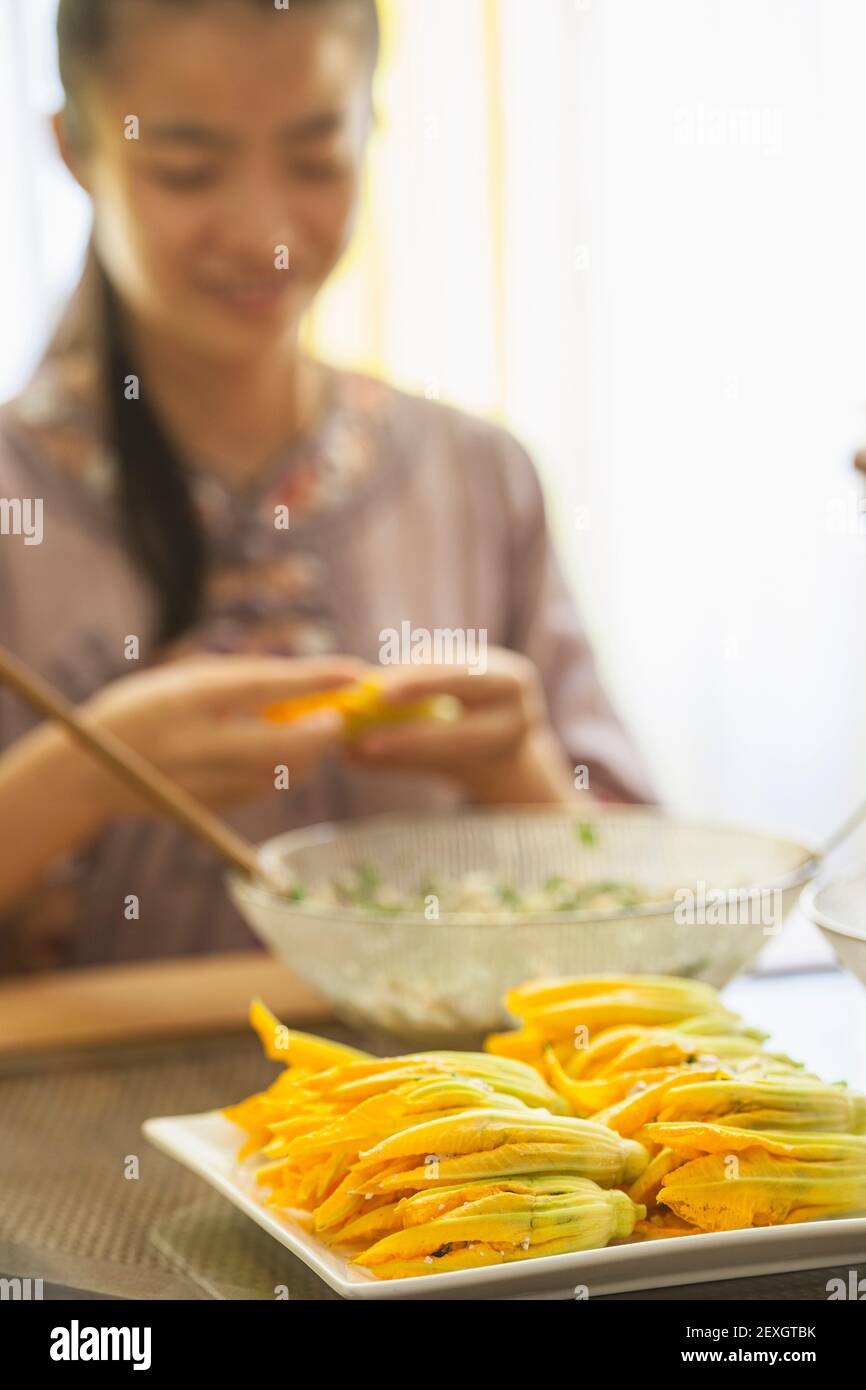 Chinese woman preparing traditional food Stock Photo - Alamy