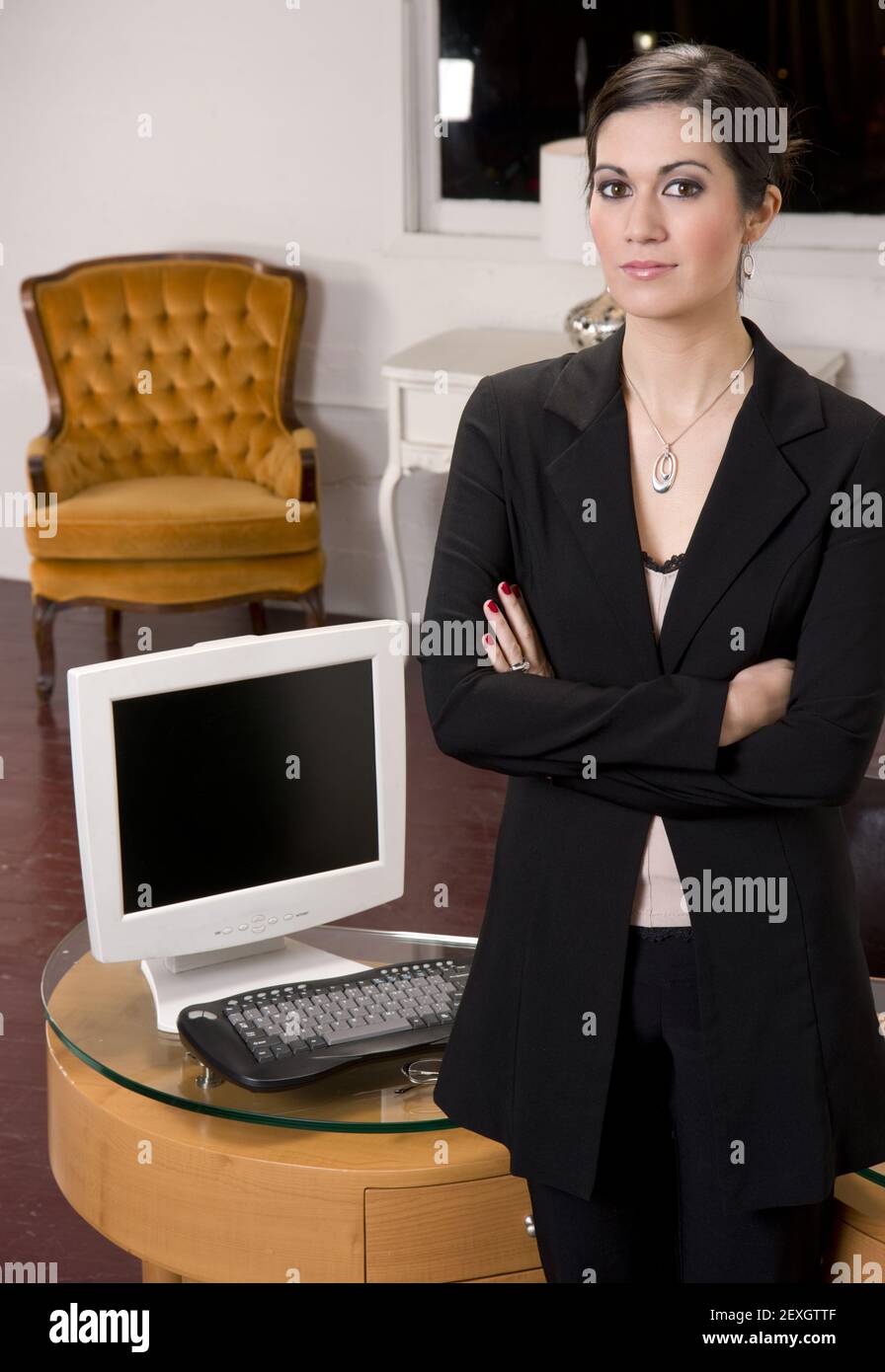 Beautiful brunette business woman desk hi-res stock photography and ...