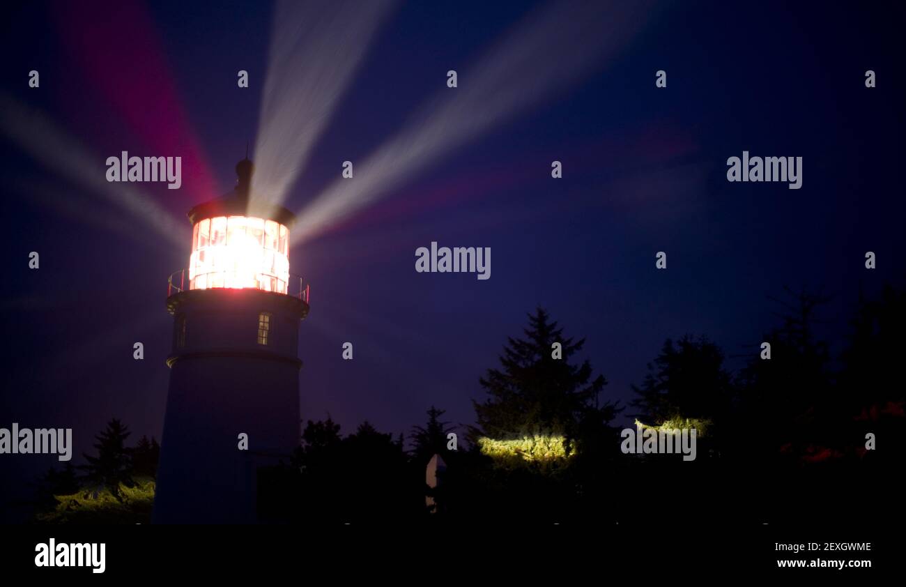 Umpqua Lighthouse Beams Light Through Rain Fog Stock Photo - Alamy