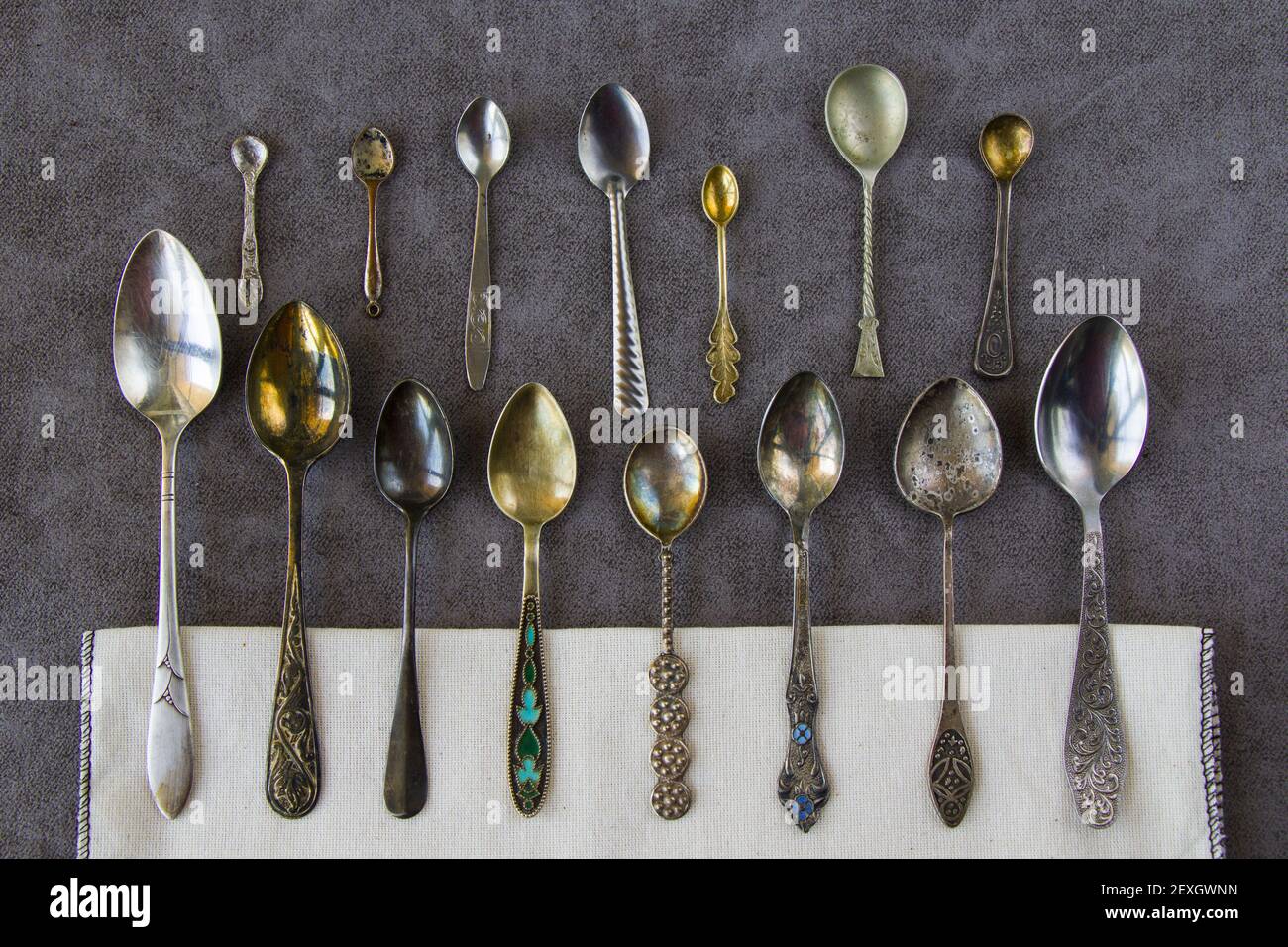 A set of antique vintage various spoons with different shapes and sizes ...