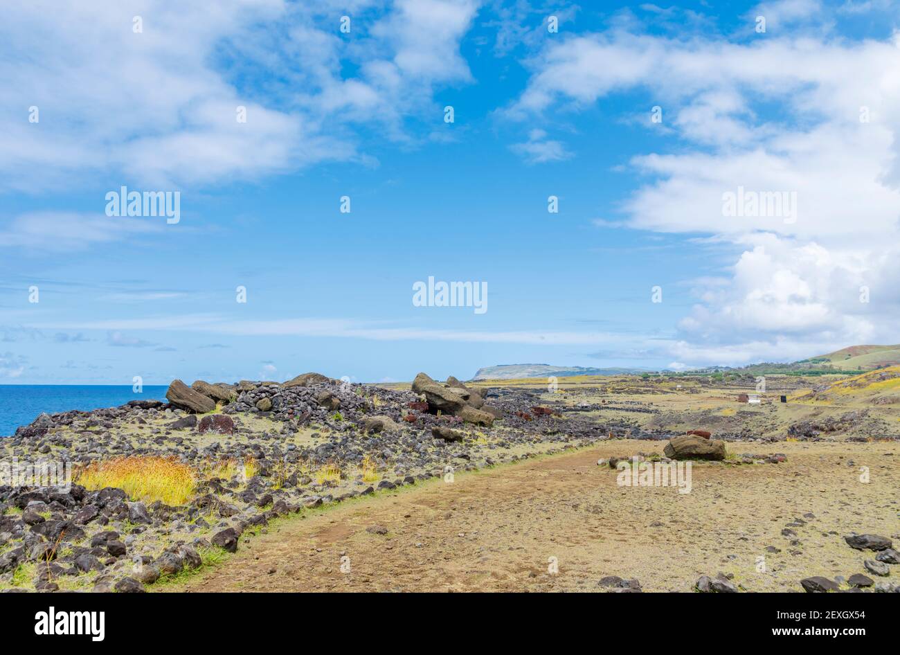 Fallen toppled moai (statues) on the ruined platform at Ahu Akahanga on ...