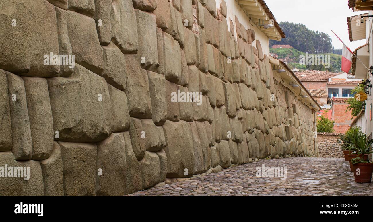 Megalithic stone wall and street in ancient city of cusco Stock Photo ...