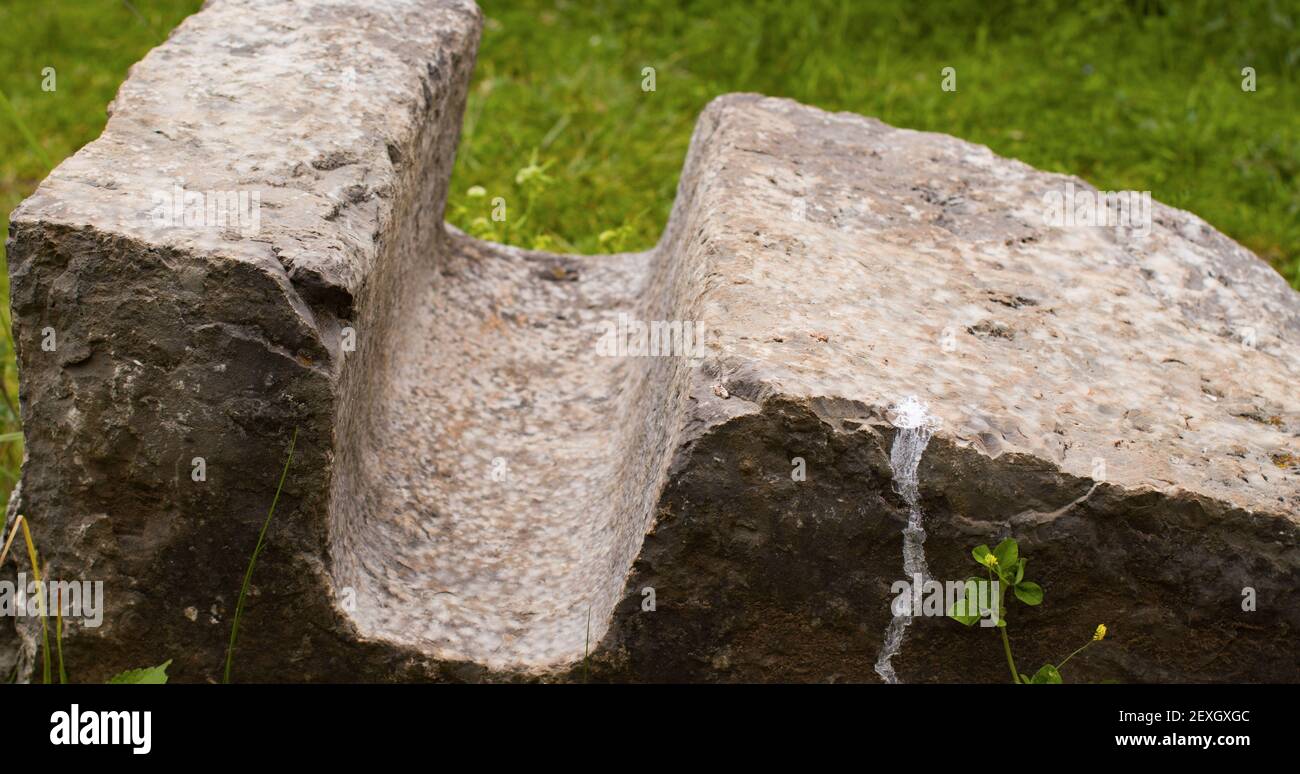 Inca stone carving of path for water in the temple of the monkey in ...