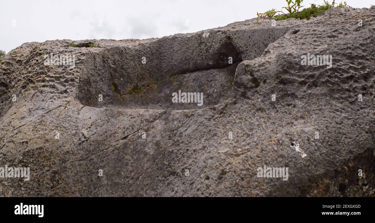 Inca Stone steps and holes carved from rock in Cusco, Peru Stock Photo ...
