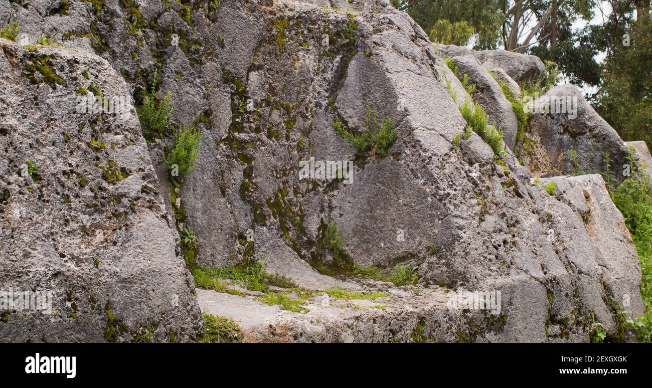 Inca Stone steps and holes carved from rock in Cusco, Peru Stock Photo ...