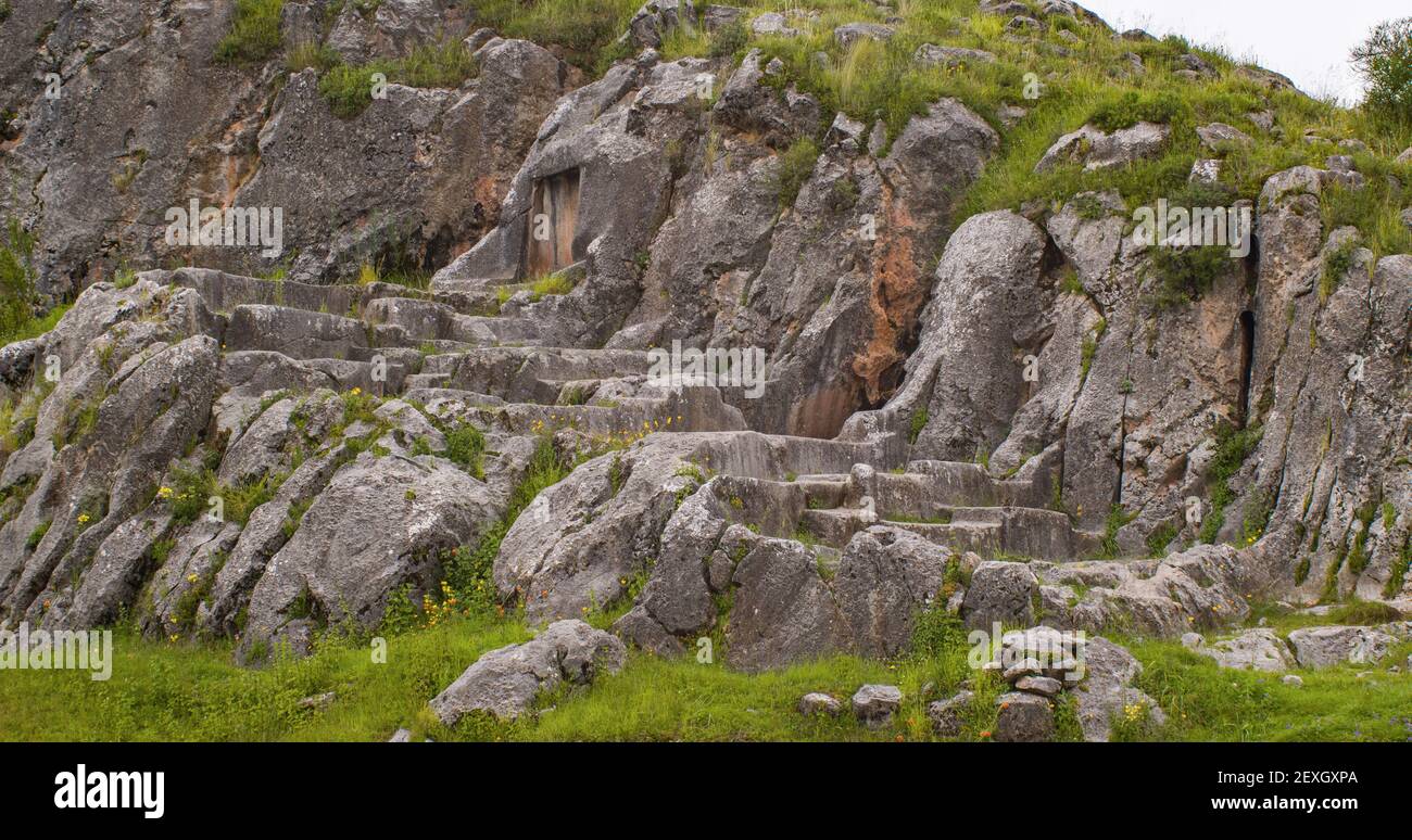 Inca ruins at temple to the moon carved cliff in cuzco Peru Stock Photo ...