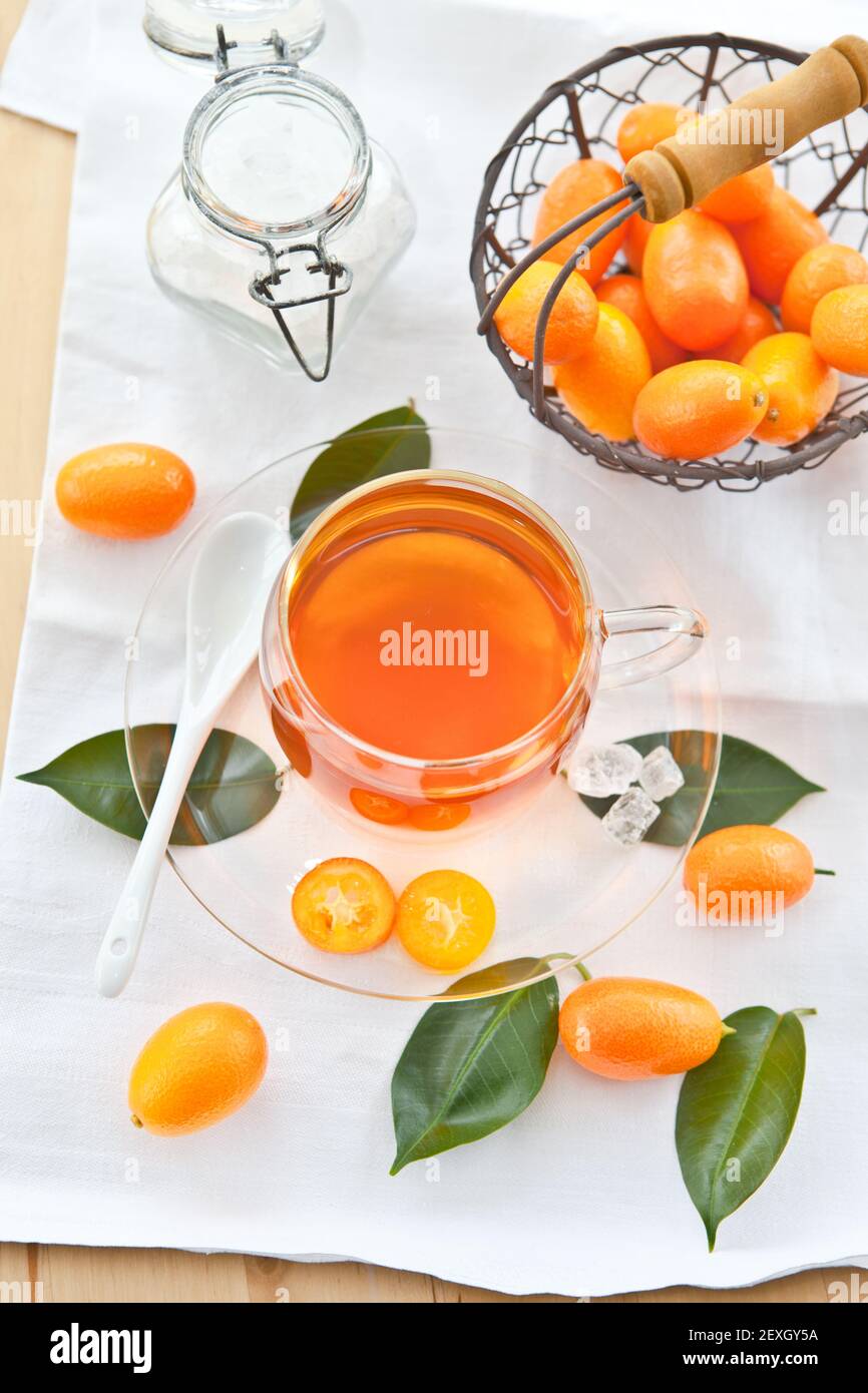 Fruit tea with kumquats Stock Photo - Alamy