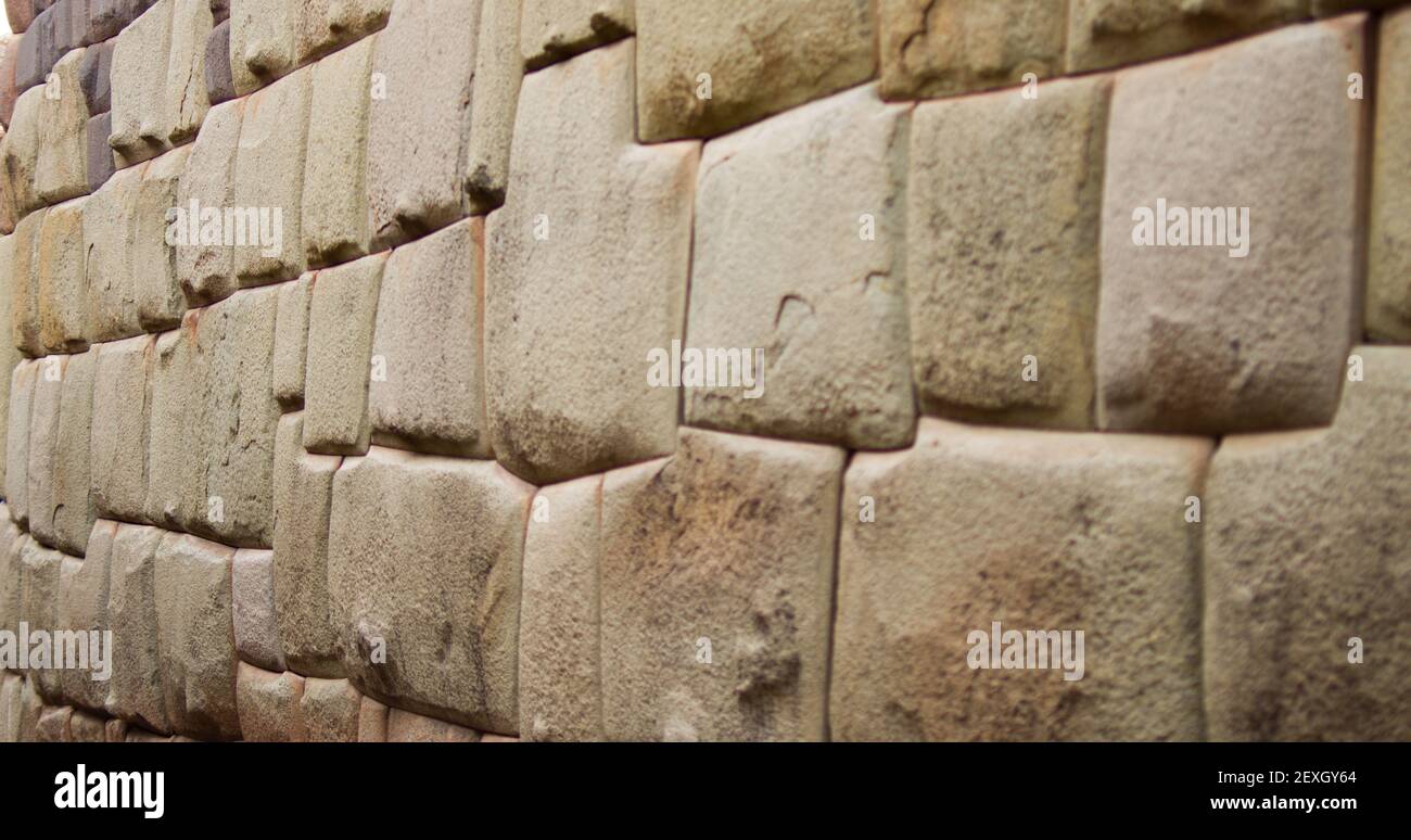 Megalithic stone wall craftmenship by the inca in ancient city of cusco ...