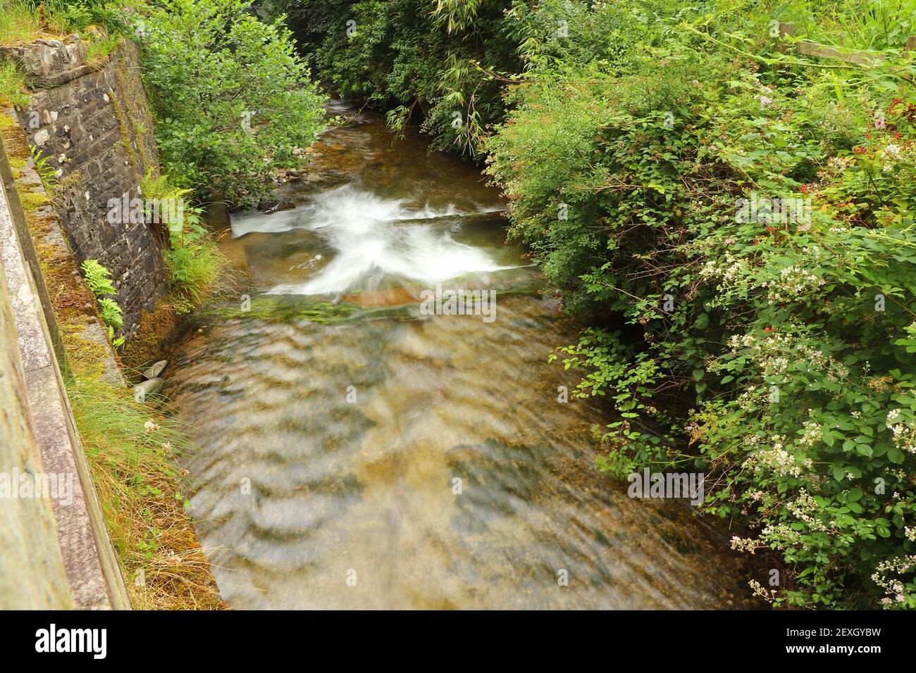 Heddon river flowing through the valley and over rocky ground Stock ...
