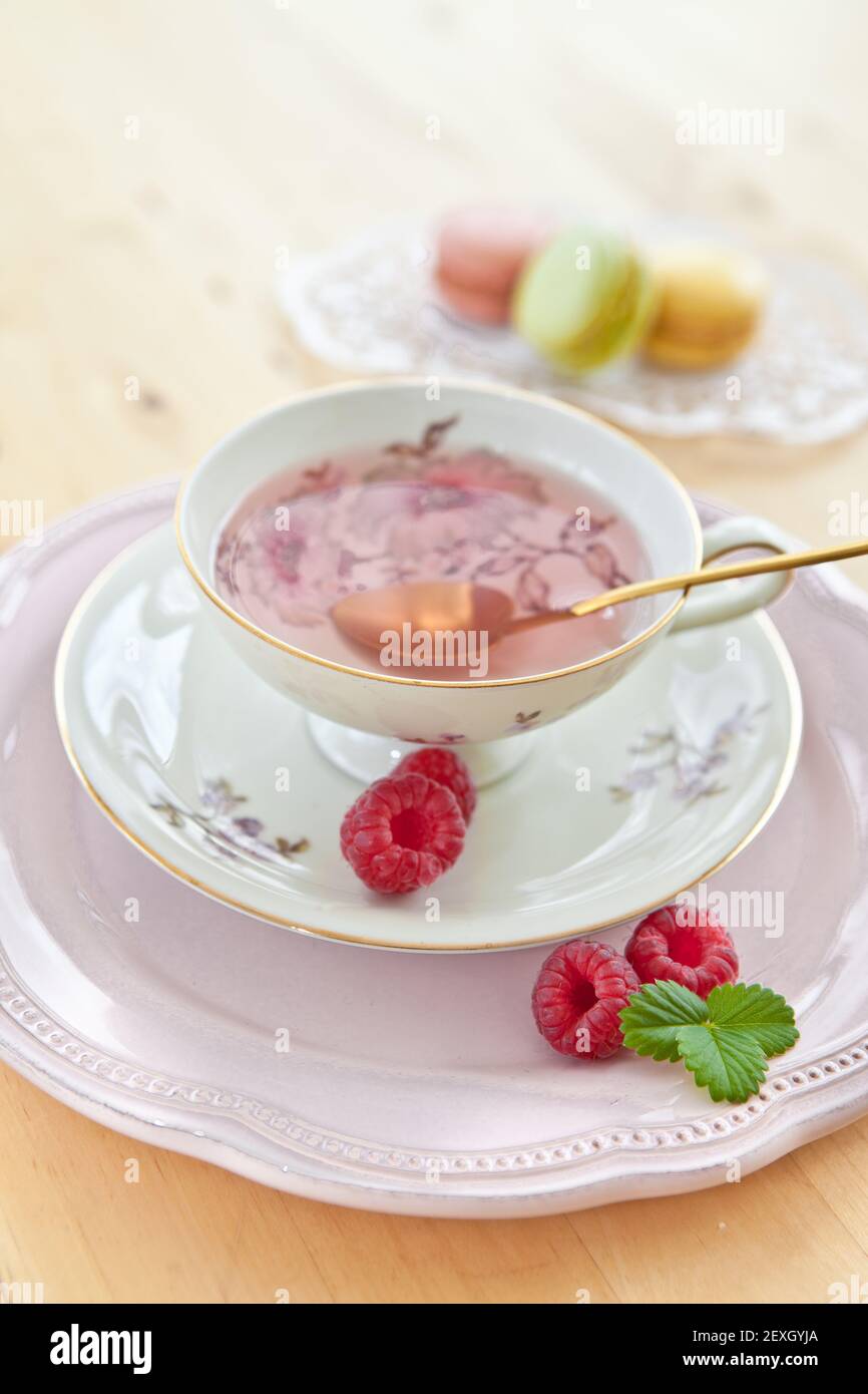 Fruit tea with raspberries Stock Photo - Alamy