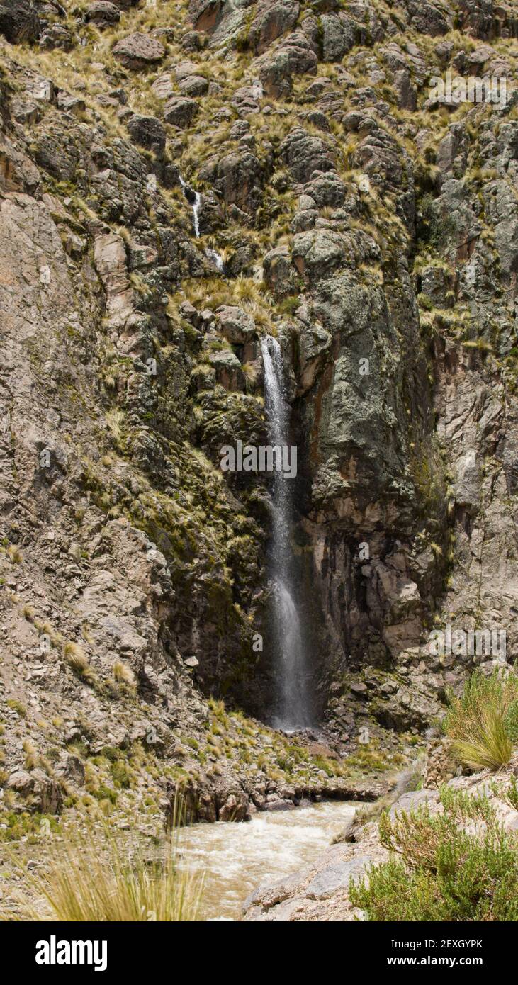bottom of Waterfall on hill side on the Andes mountain Range, Peru ...