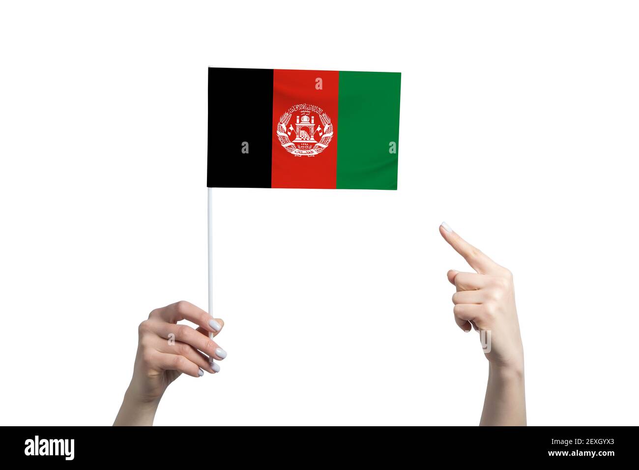 A beautiful female hand holds a Afghanistan flag to which she shows the ...