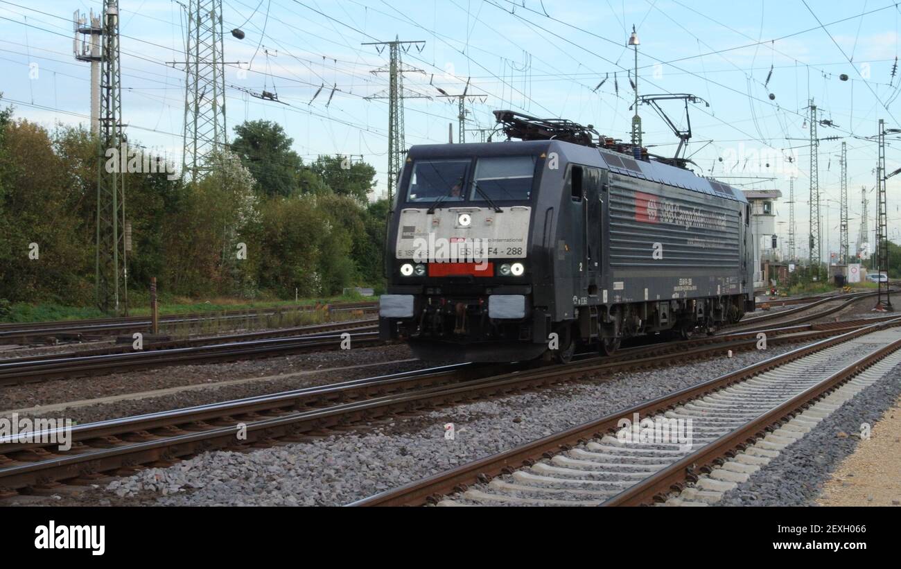 A class 189 EuroSprinter electric powered locomotive with goods wagons ...