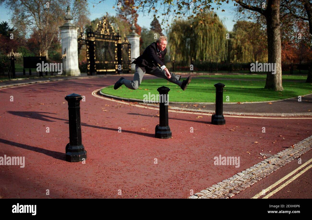 David Hemery in Regents Park November 1998hurdles a bollard after being ...