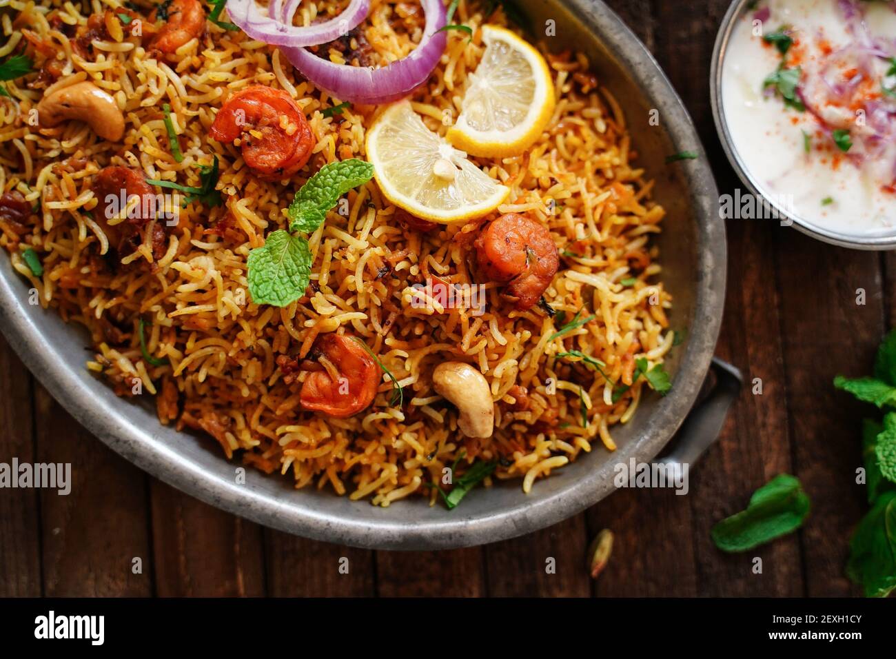 Homemade Prawn Shrimp biryani served with Yogurt Raita and beet pickle ...