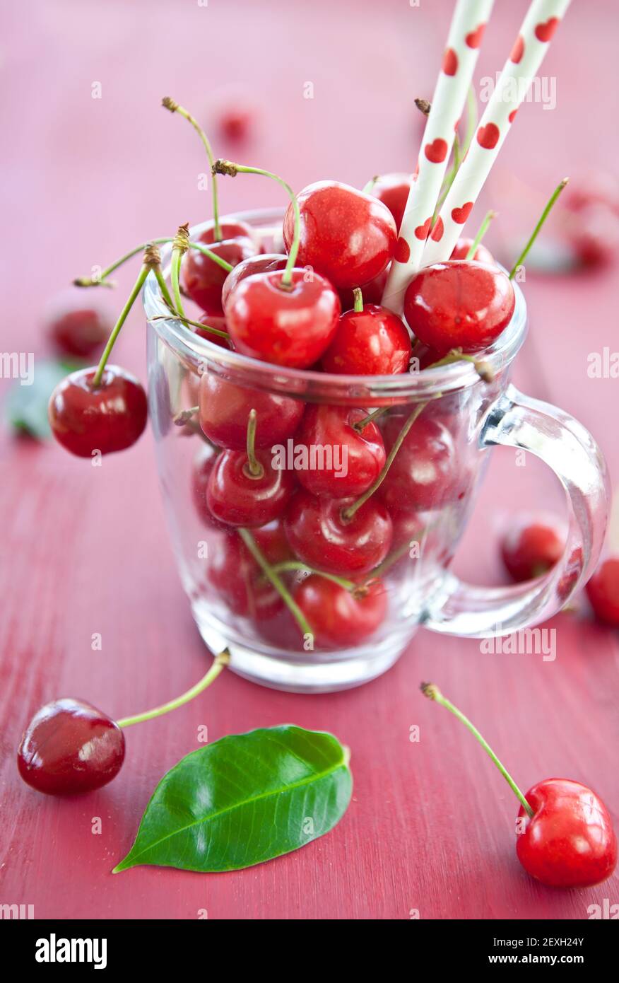 Fresh cherries in a cup Stock Photo - Alamy