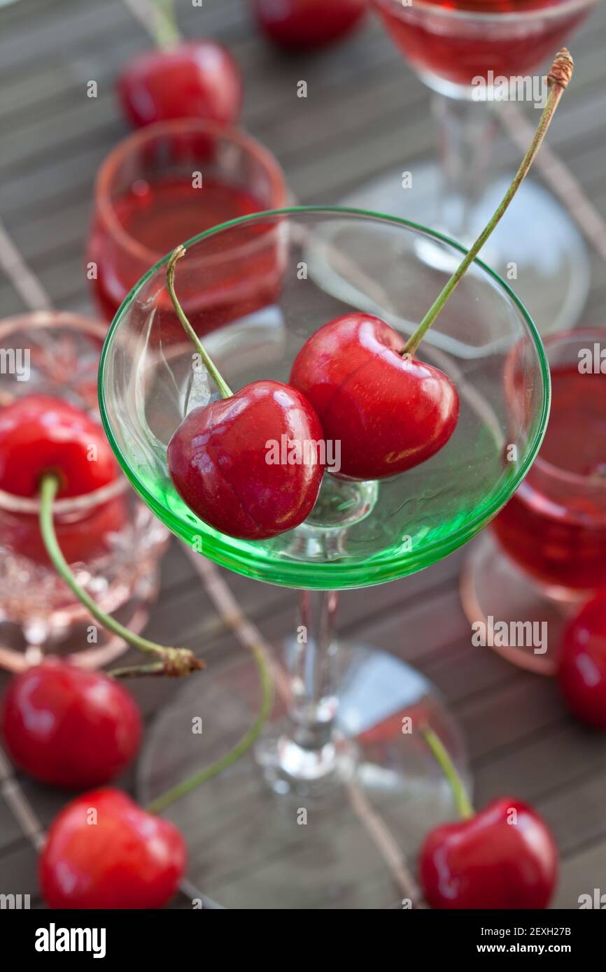 Fresh cherries in small jar Stock Photo - Alamy
