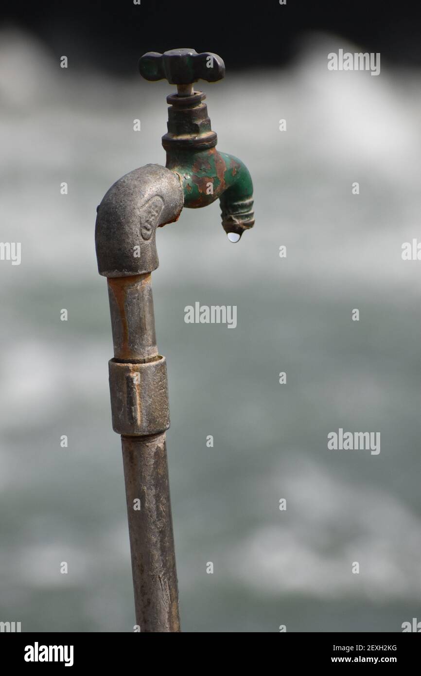 A vertical shot of a rusty outdoor tap Stock Photo - Alamy