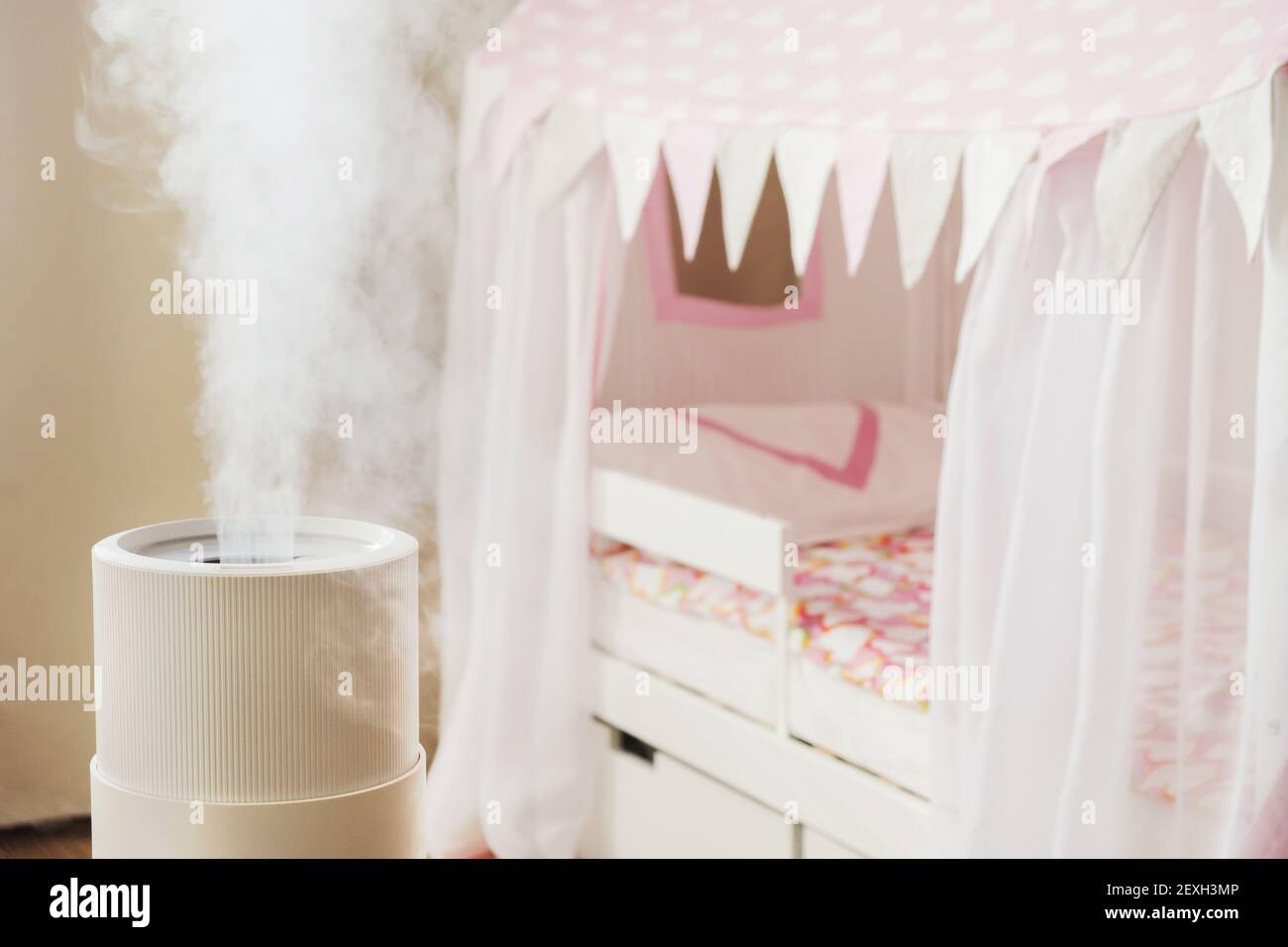 Modern air humidifier in children's room, aroma oil diffuser at home ...