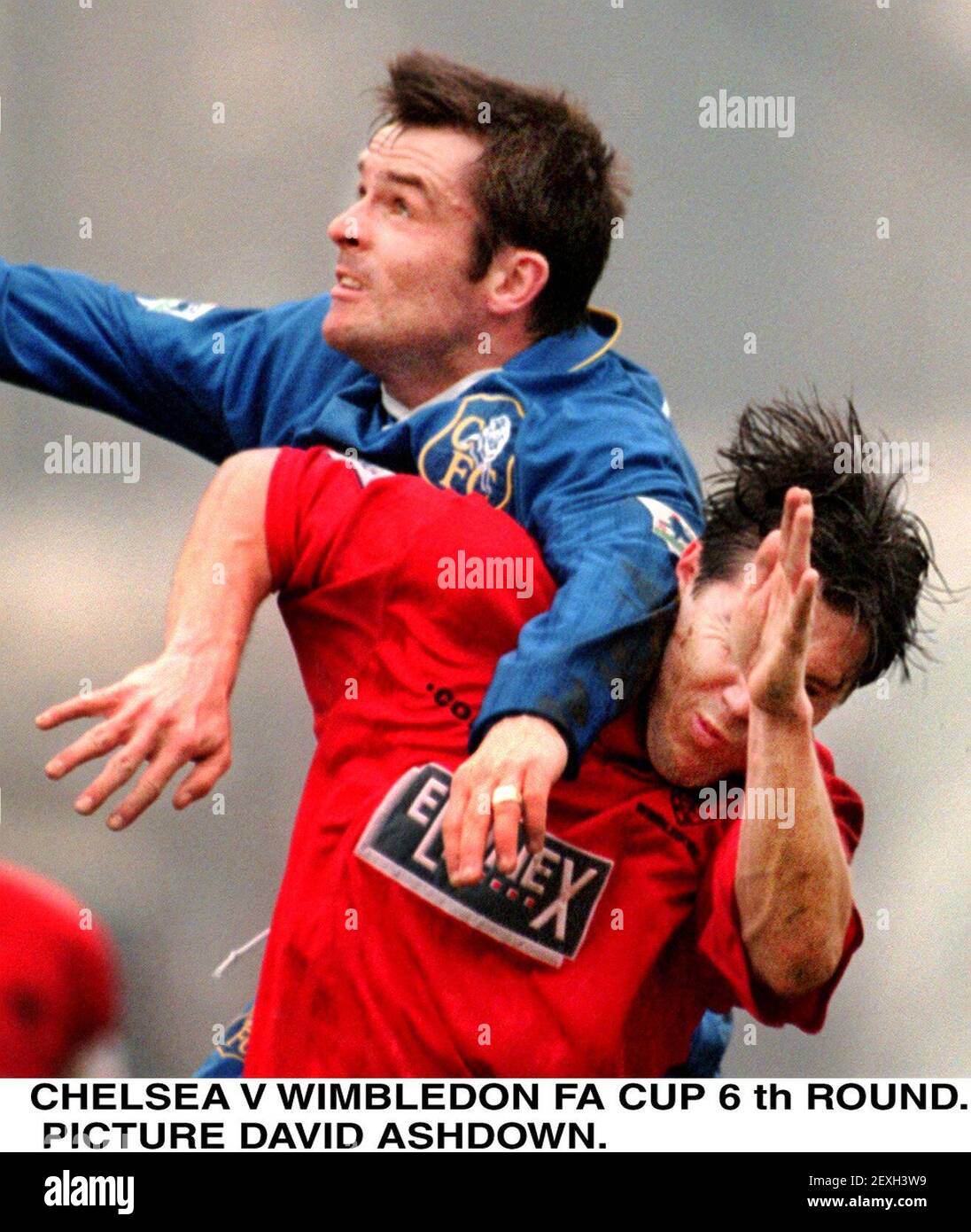 John Spencer Footballer of Chelsea rises above a Wimbledon defender ...