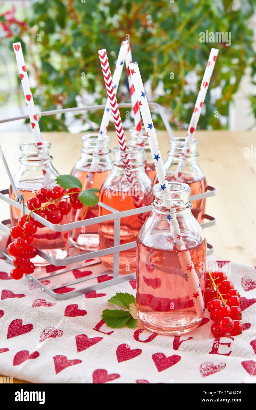 Fresh lemonade in small bottles Stock Photo - Alamy