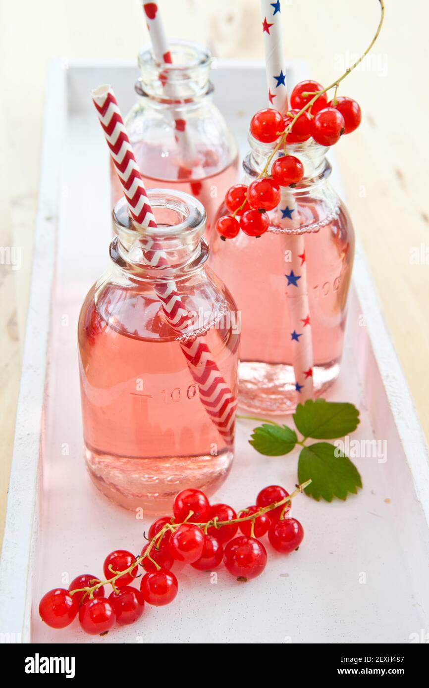 Fresh lemonade in small bottles Stock Photo - Alamy