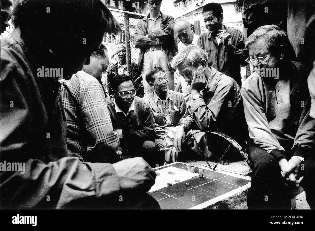 CHINESE MEN PLAYING A BOARD GAME ON THE STREETS OF HONG KONG Stock ...