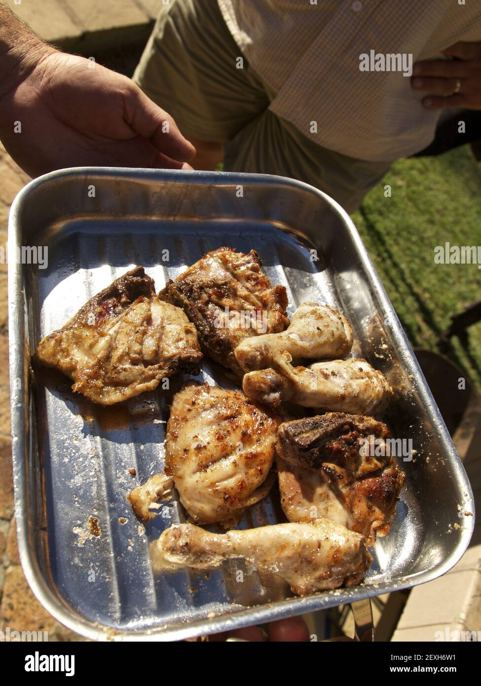 Man eating barbecue chicken hi-res stock photography and images - Alamy